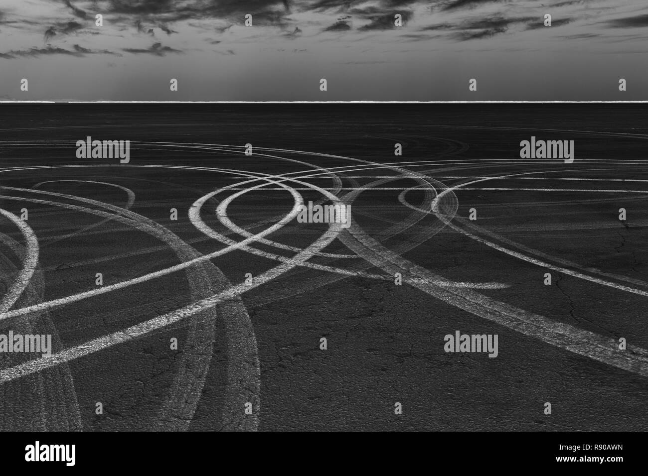 Monochrome inverted image of tire tracks on Salt Flats at dawn Stock ...