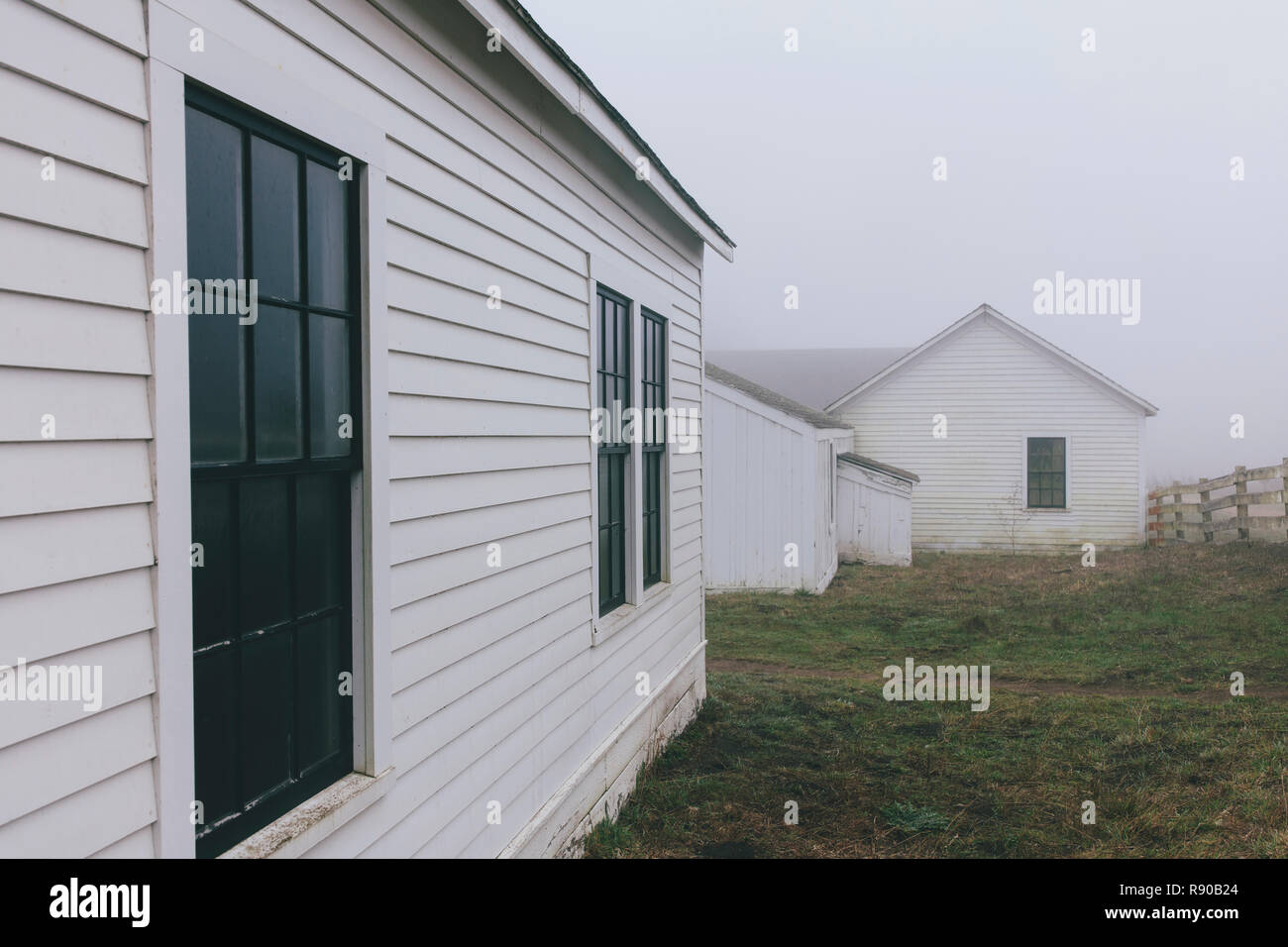 Outbuildings and barn on farm with dense fog, Historic Pierce Point ...