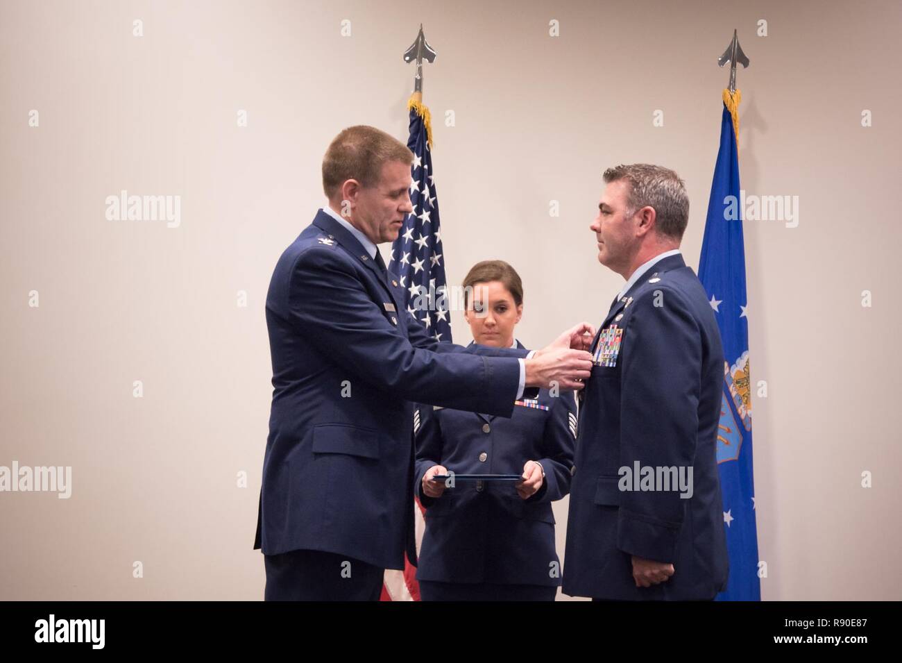 Retired Col. Howard Ward Jr. presents a Meritorious Service Medal to ...
