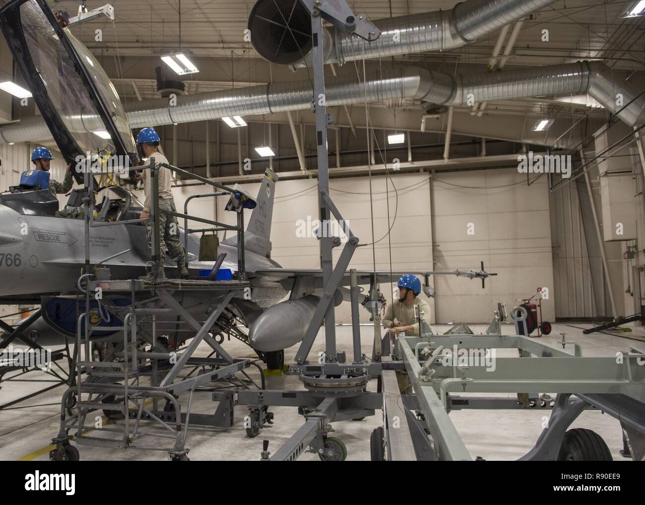 54th Maintenance Squadron egress system specialists remove a canopy ...
