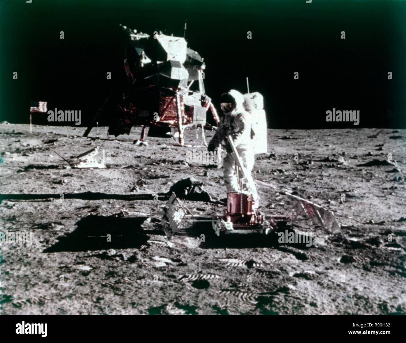 Buzz Aldrin sets up the seismic experiment, Apollo II mission, July ...