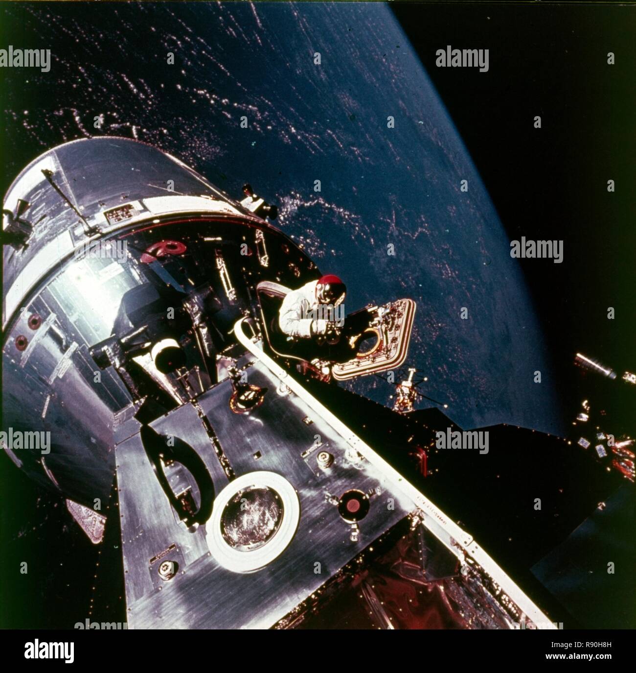 Module pilot David Scott emerging from Apollo 9 spacecraft, 6 March ...