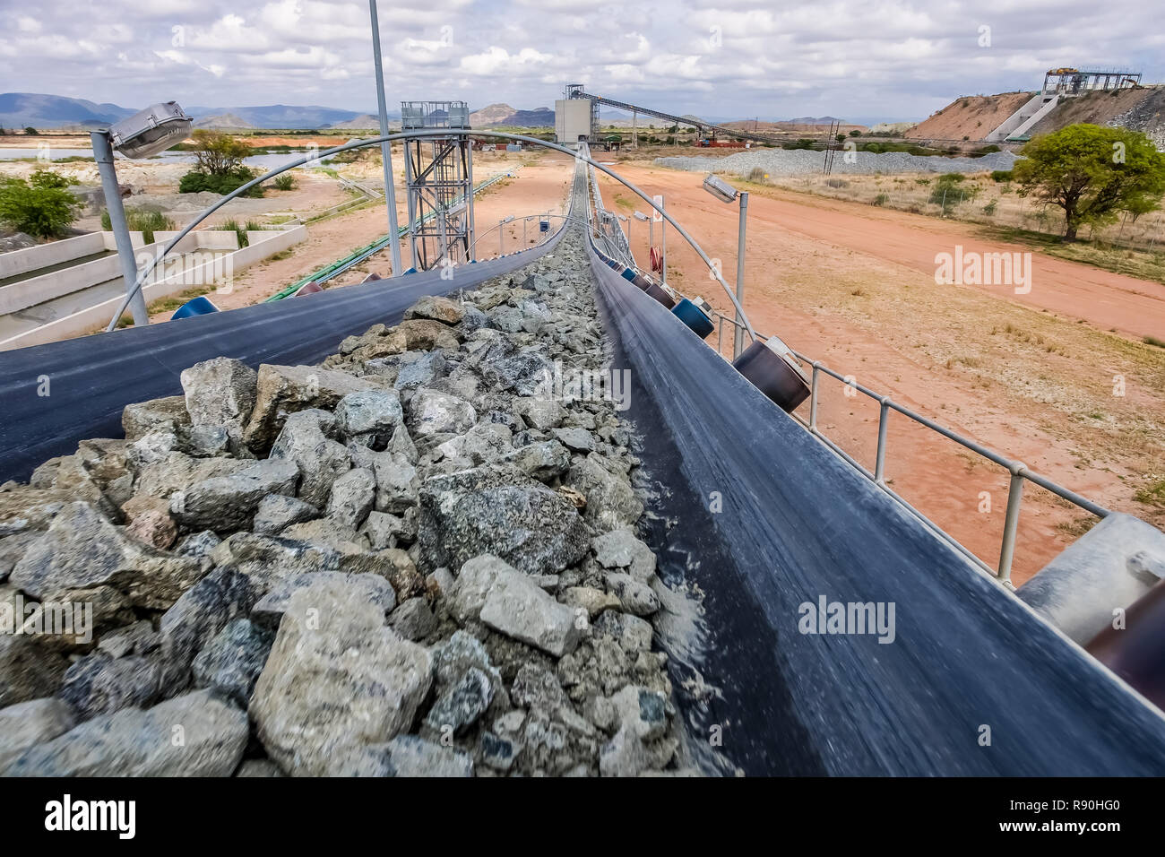 Platinum Mining and Processing of ore, Piles of ore rock being moved ...