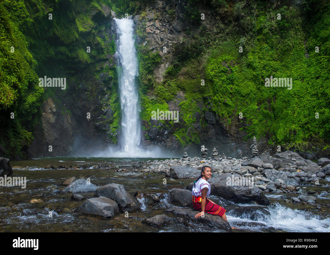Girl from Ifugao Minority near a waterfall in Batad the Philippines ...