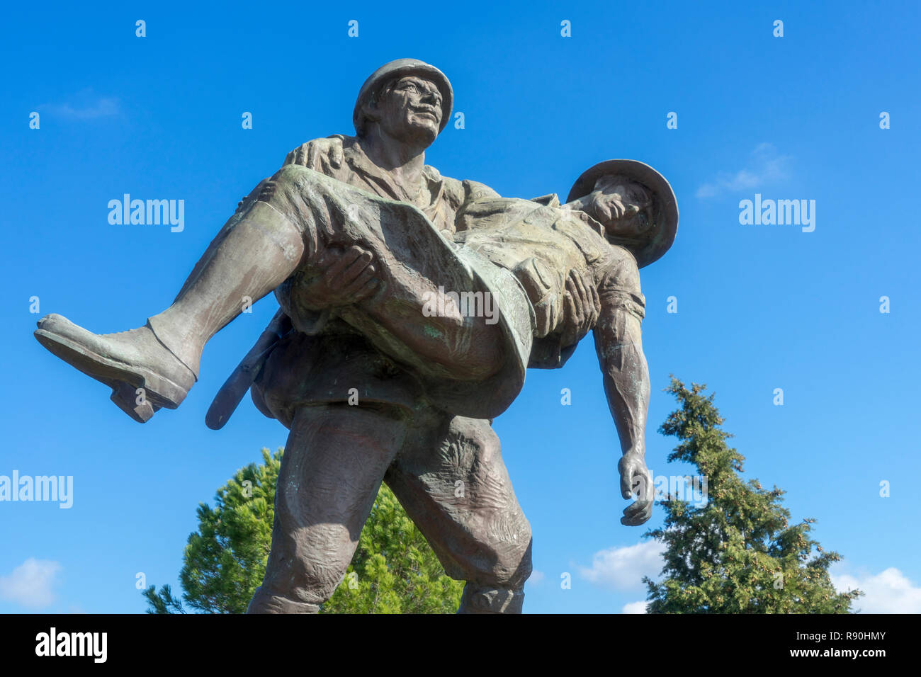 Monument of a Turkish soldier carrying wounded Anzac soldier at ...