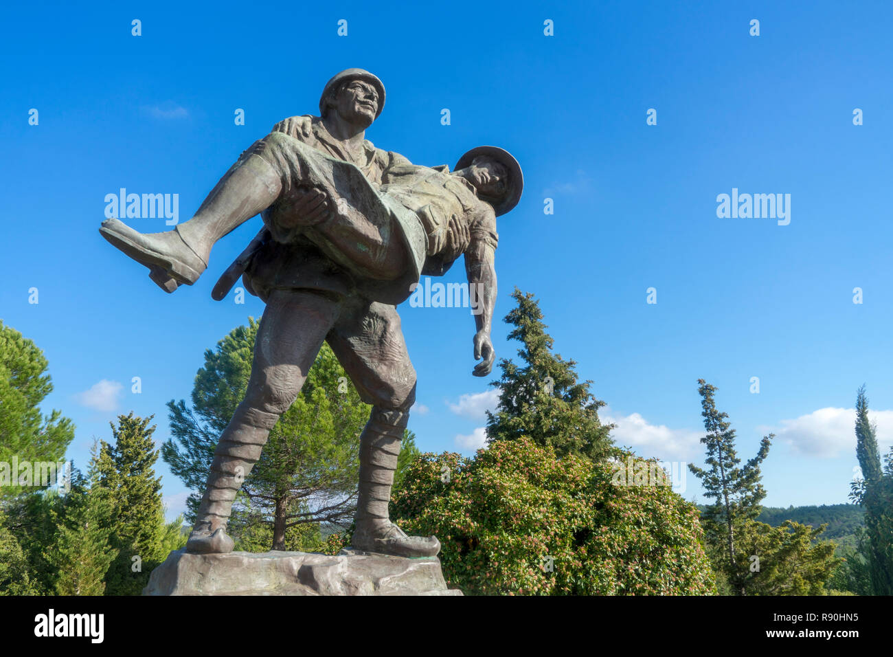Monument of a Turkish soldier carrying wounded Anzac soldier at ...