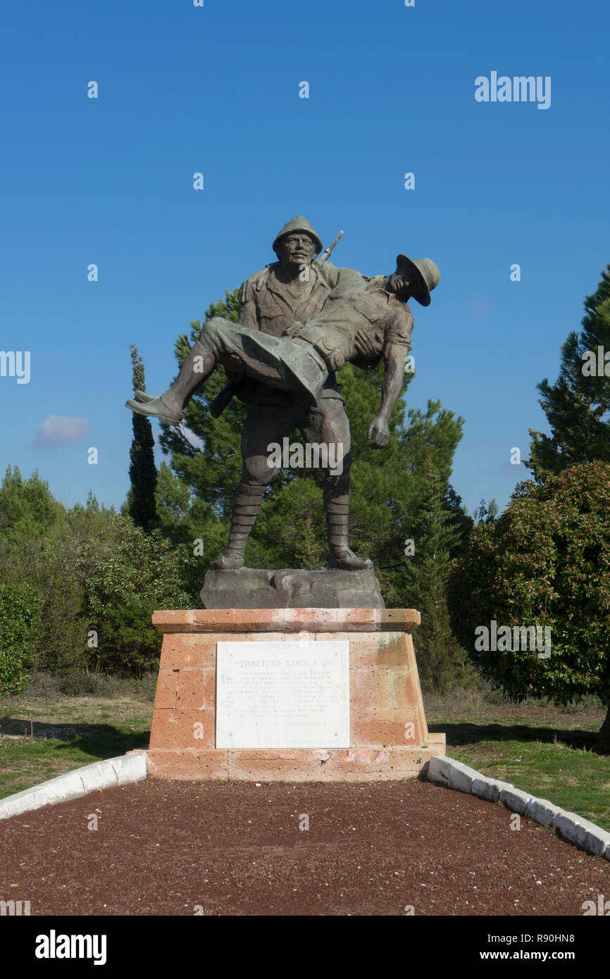 Soldier Carrying Another Soldier Statue