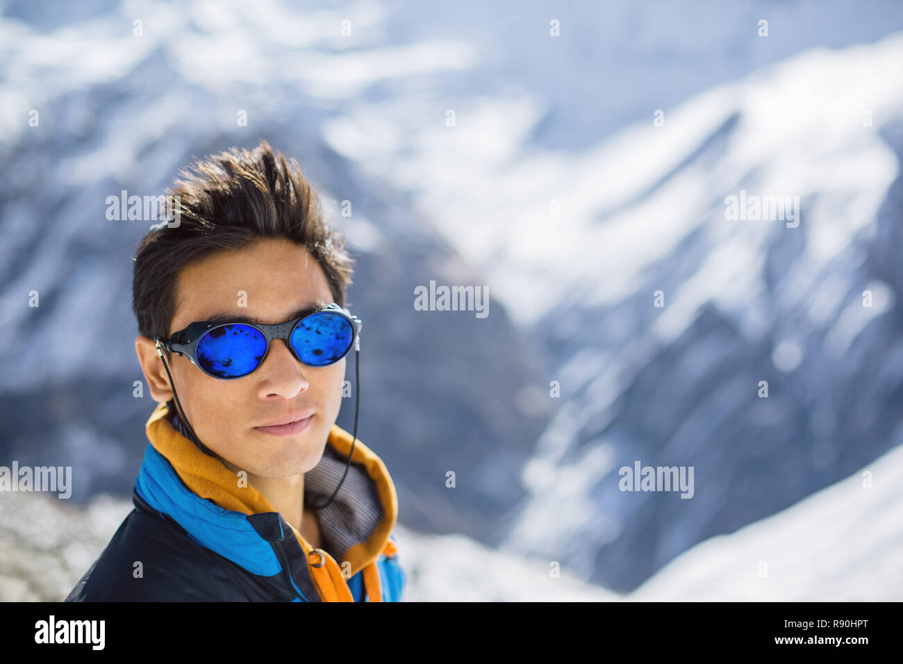Young man climbing himalayas hi-res stock photography and images - Alamy