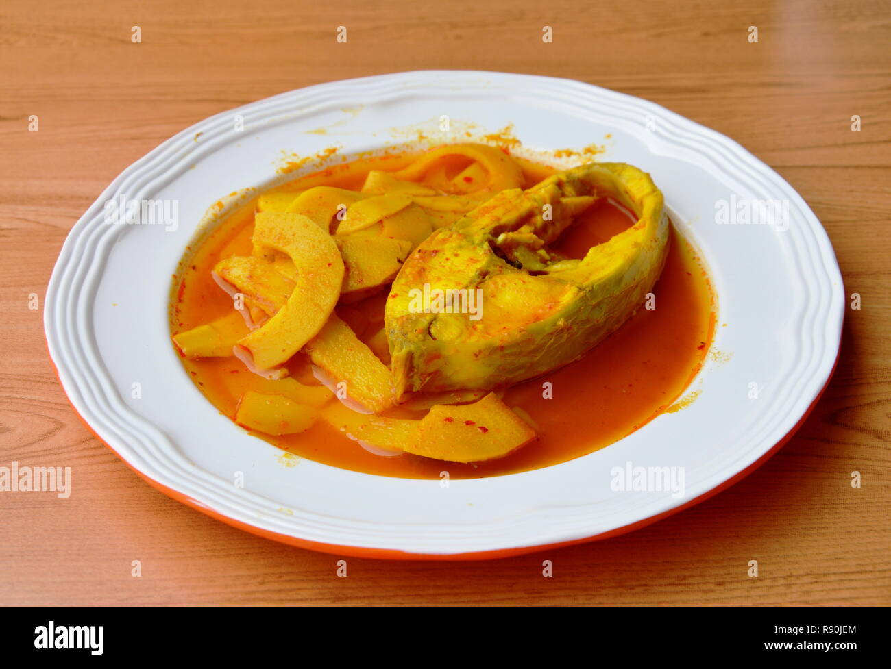 boiled red mango fish with pickled bamboo shoot in spicy and sour soup ...
