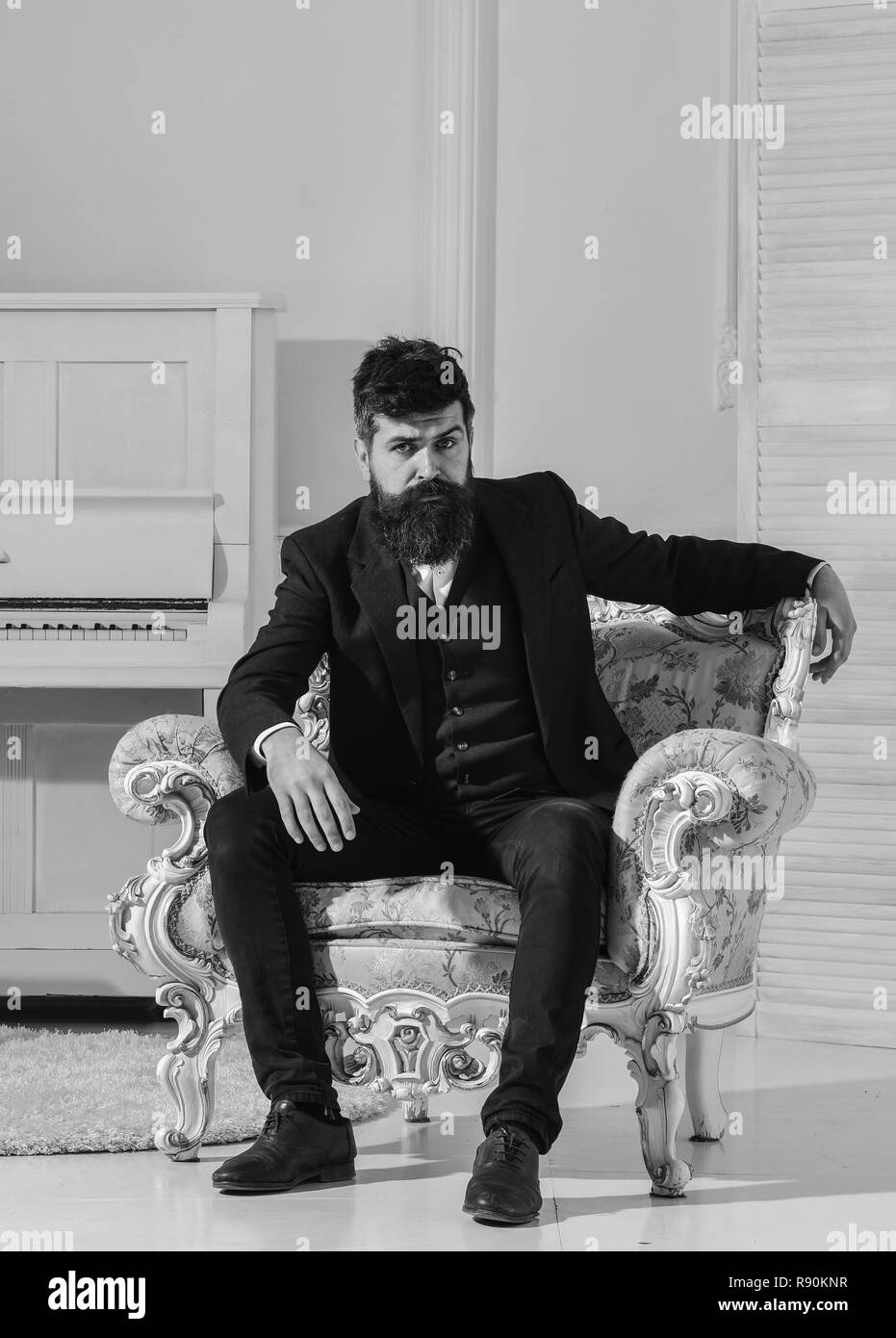 Wealth and richness concept. Man with beard and mustache wearing ...