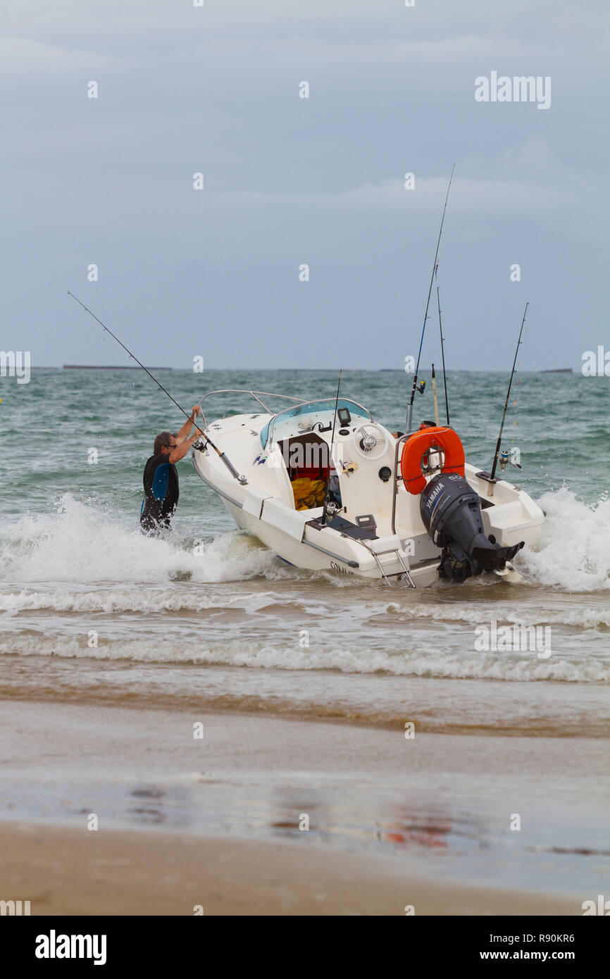 Two men fishing from a boat hi-res stock photography and images - Alamy
