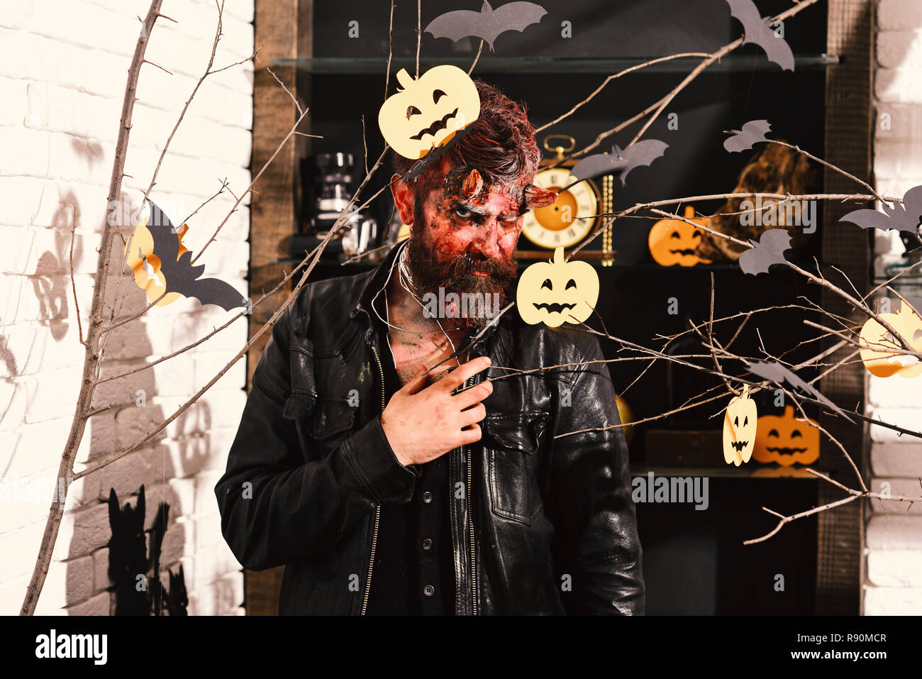 Devil or monster partying. Demon with horns, evil face and dried blood ...