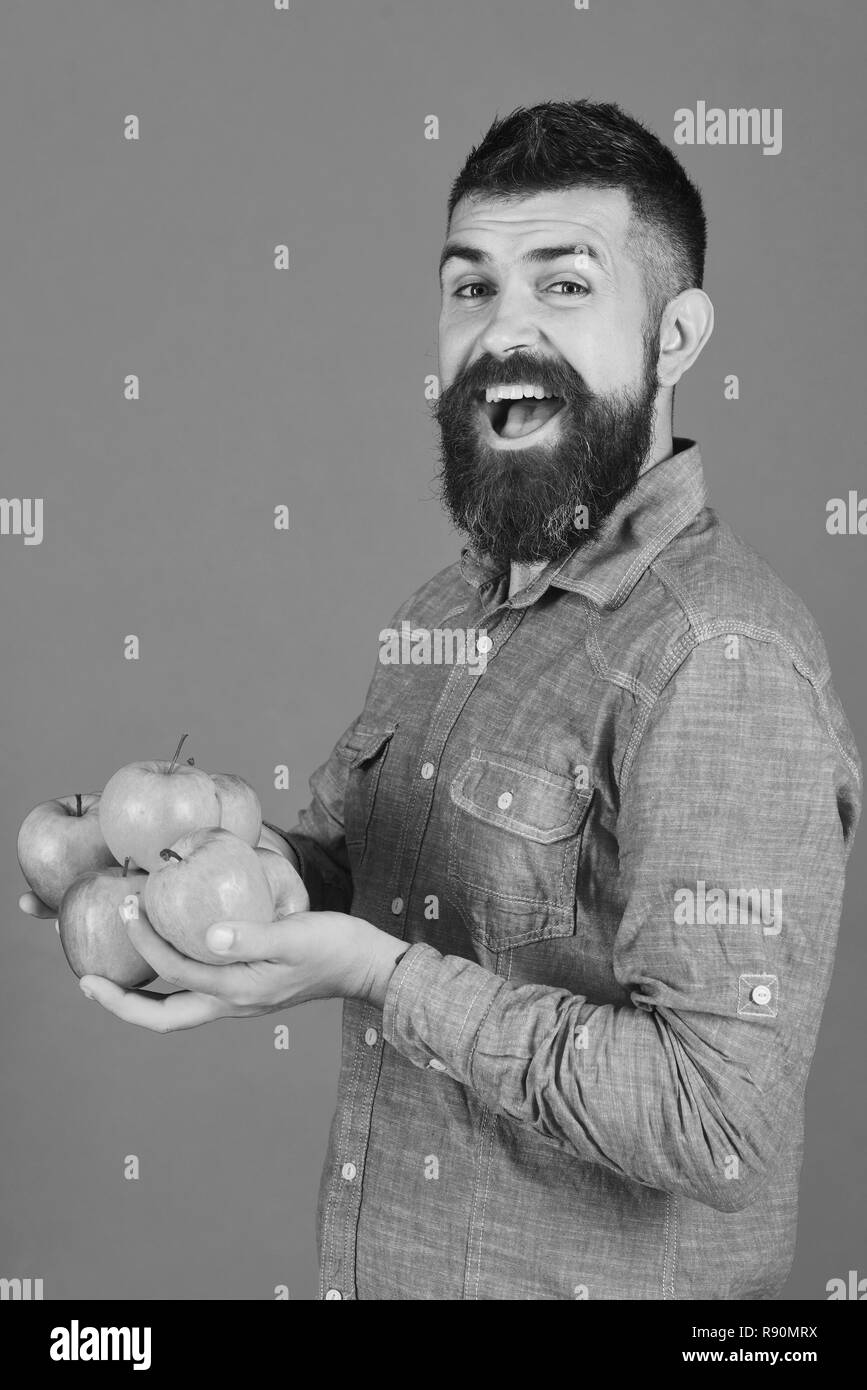 Gardening and fall crops concept. Farmer with cheerful face and hands ...