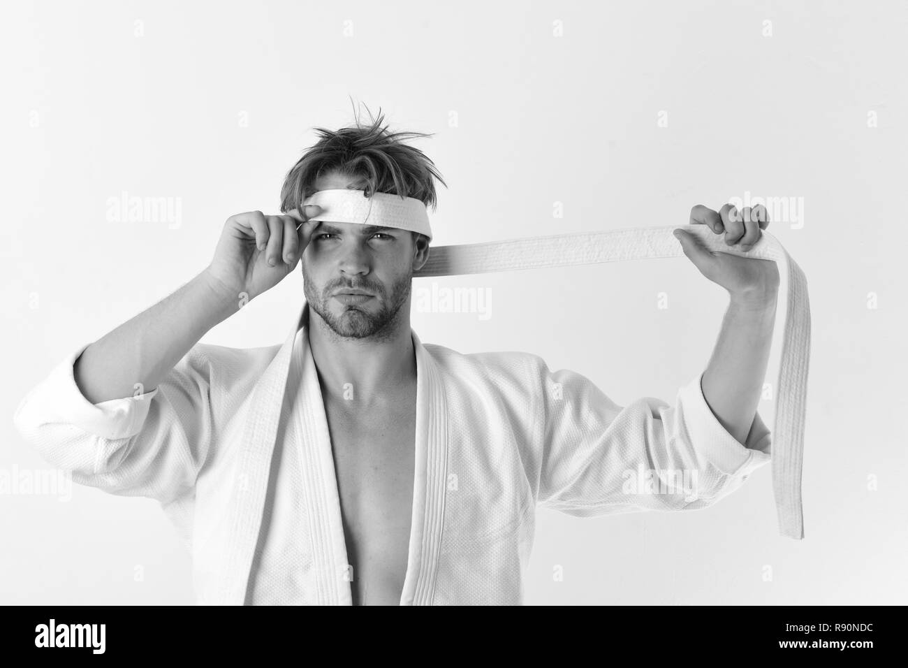 Healthy lifestyle and jujitsu concept. Karate fighter with strong body ...