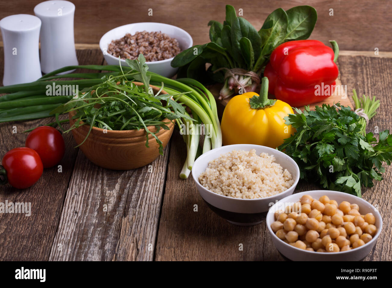 Selection of fresh vegetables and cooked cereal, grains and legume ...