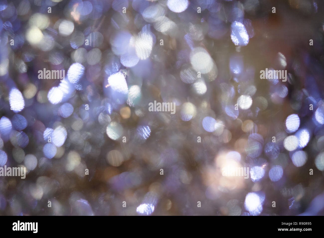 Lens flare flickering on black hi-res stock photography and images - Alamy
