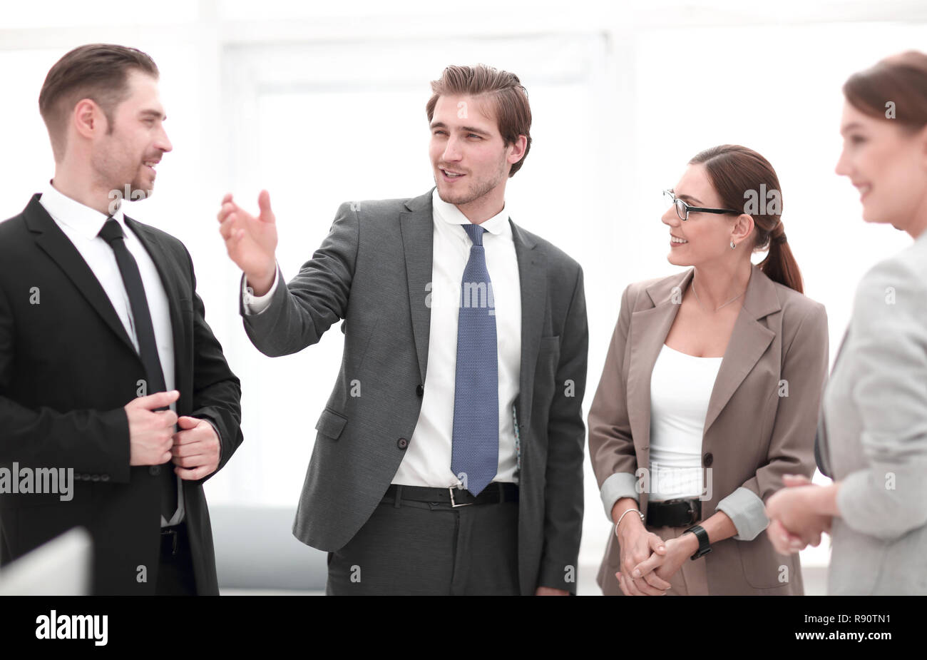 businessman explaining his ideas to his colleagues Stock Photo - Alamy