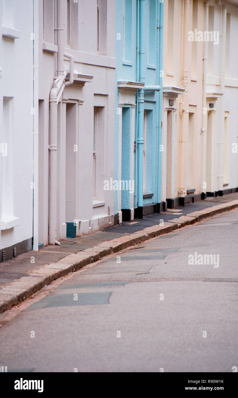Row of terraced houses on a street in Fowey, Cornwall, England, UK ...