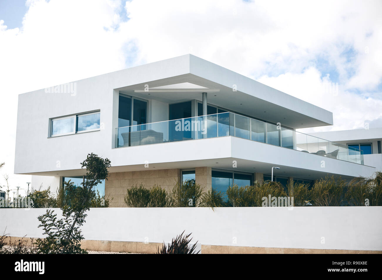 White residential building in the south of Portugal against the blue ...