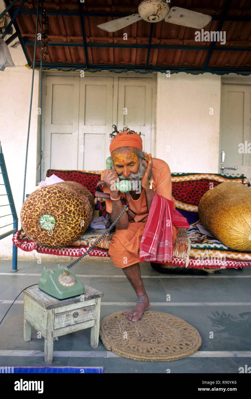 Sadhu Using Modern Telephone, Junagarh, Gujarat, India Stock Photo - Alamy