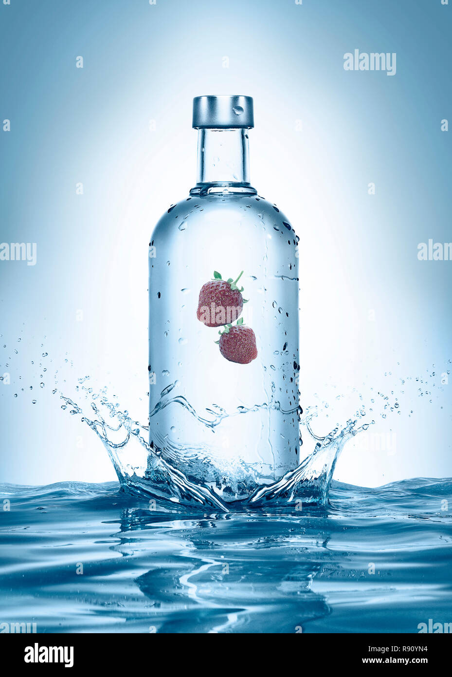 wet transparent clean alcohol bottle with water splashes and drops ...