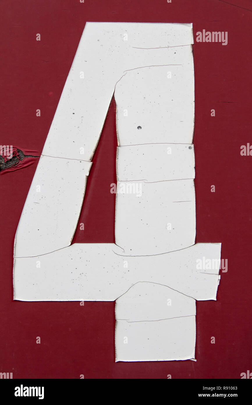 number four painted on grungy surface, number 4, four, old sticker ...