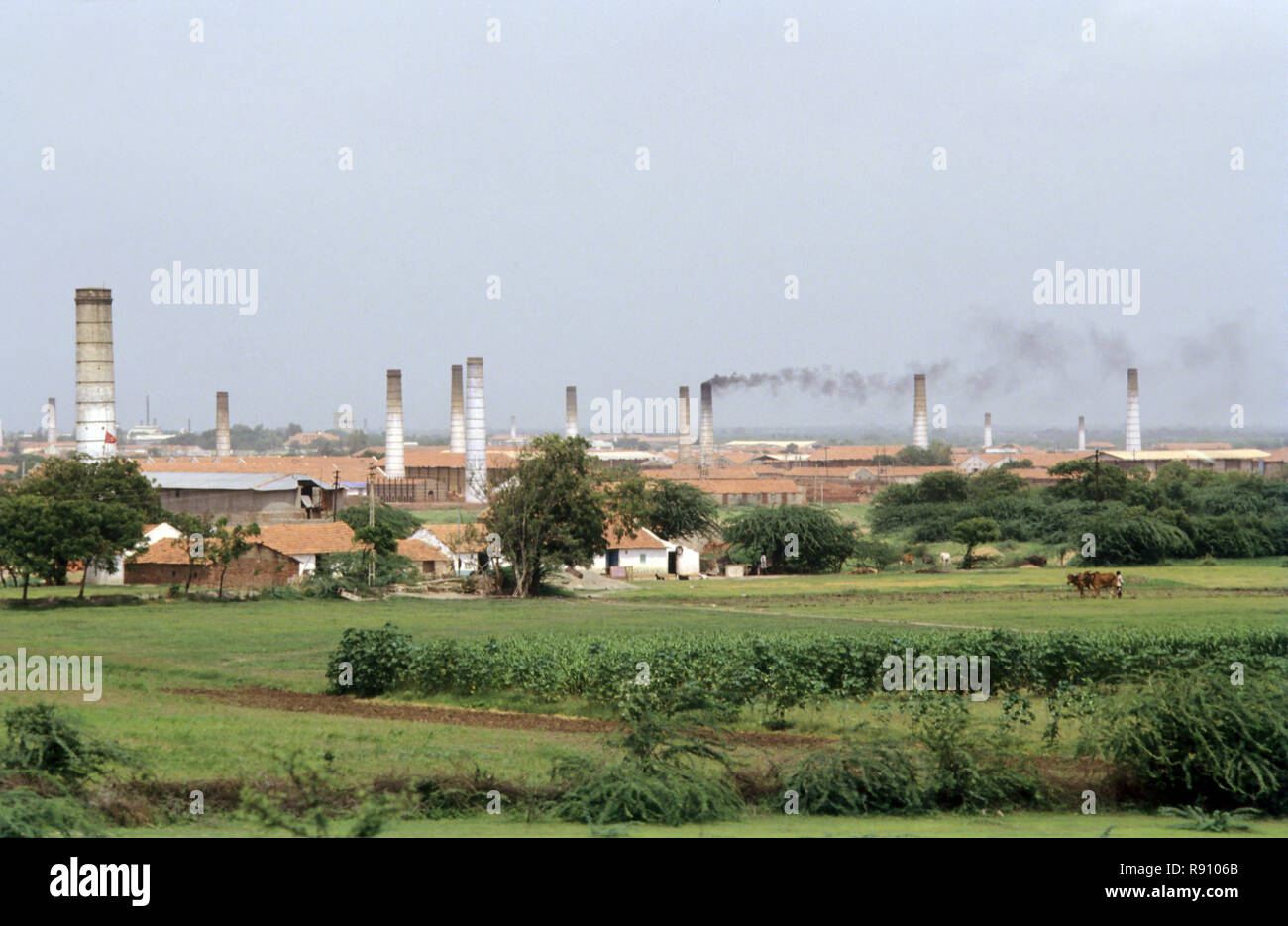 chimneys of potteries at morvi, gujarat, india Stock Photo - Alamy
