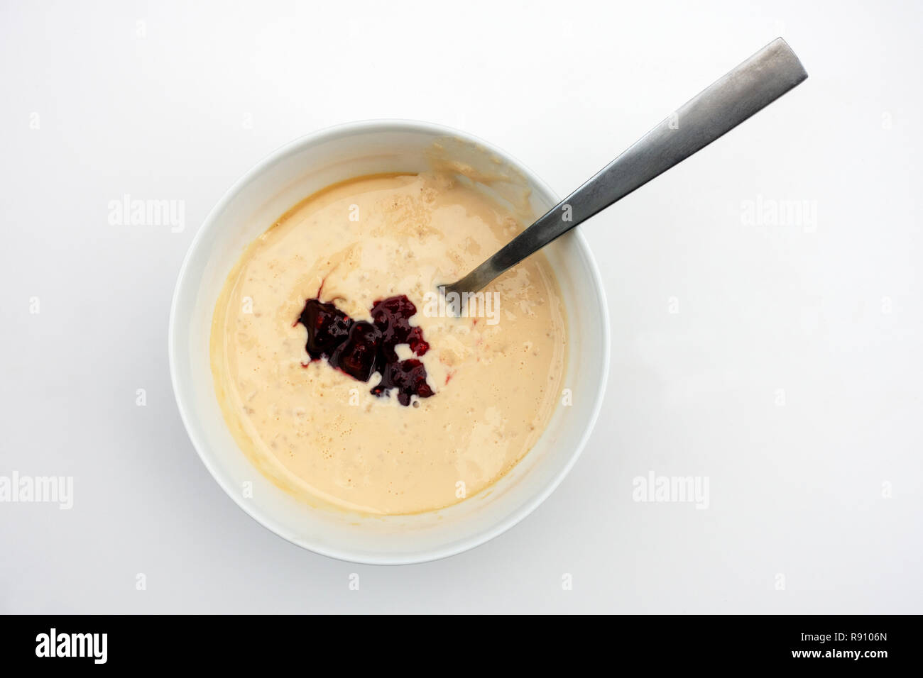 Rice pudding with strawberry jam Stock Photo - Alamy