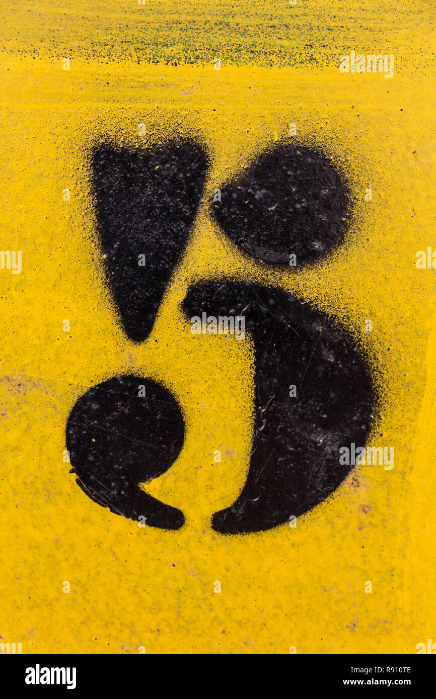 number stencil painted on yellow background, number 5, number five ...