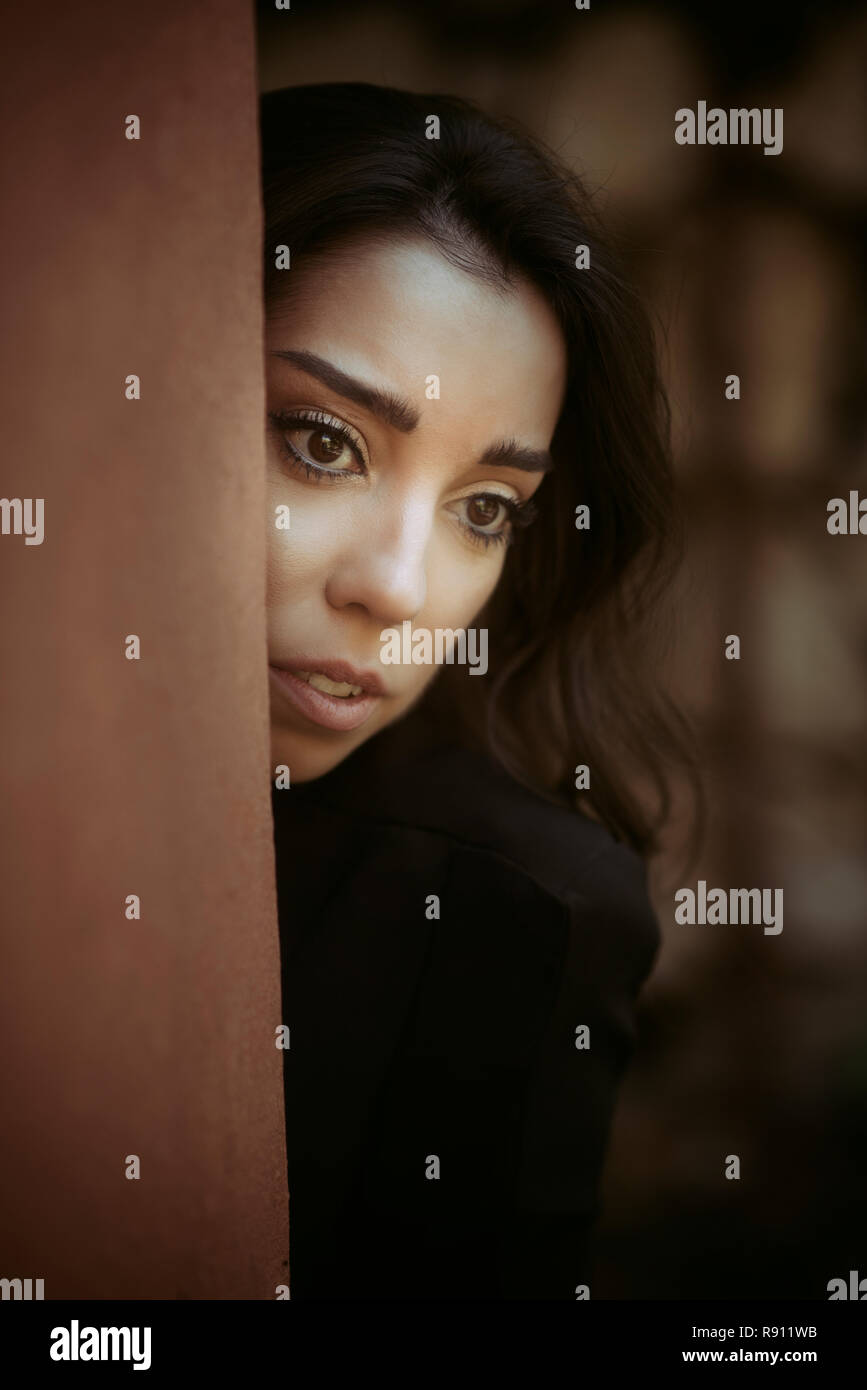 Young attractive woman hiding hi-res stock photography and images - Alamy