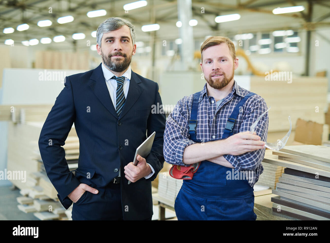 Industrial investor and young engineer Stock Photo - Alamy
