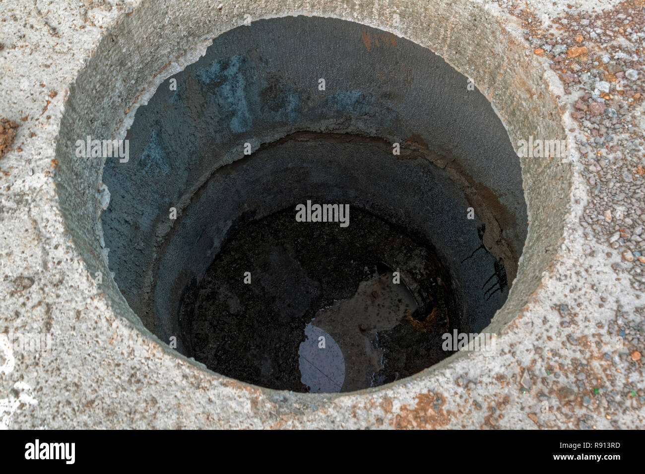 Concrete construction tube pipe. Building a road sewer drain system ...