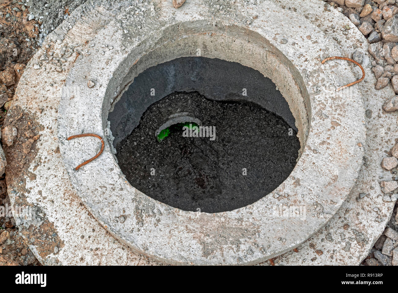 Concrete construction tube pipe. Building a road sewer drain system ...