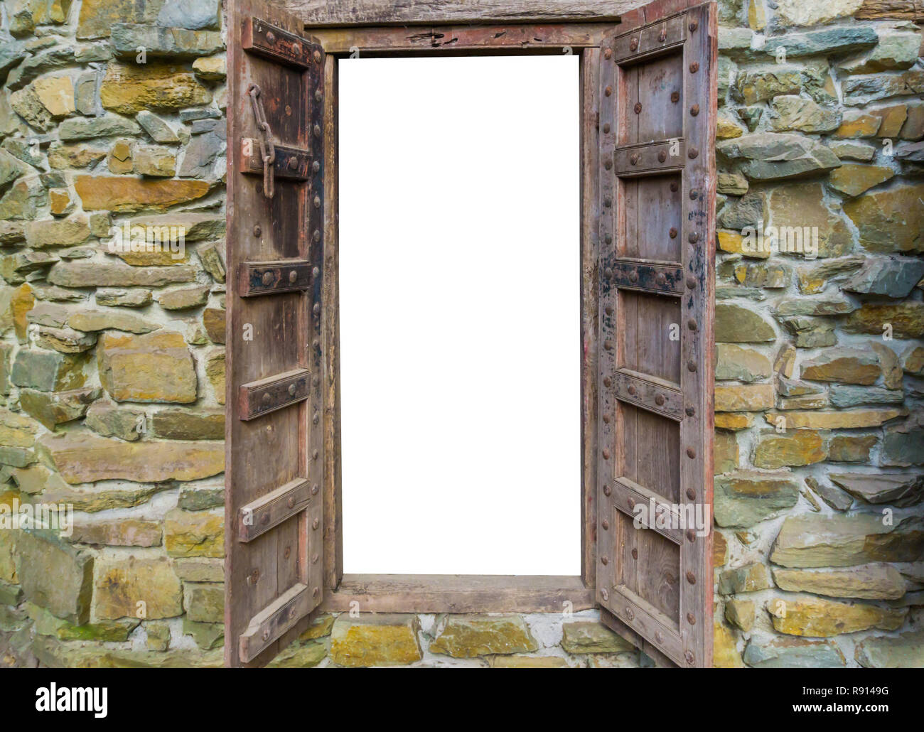 old medieval style wooden window frame in a brick wall, open and ...