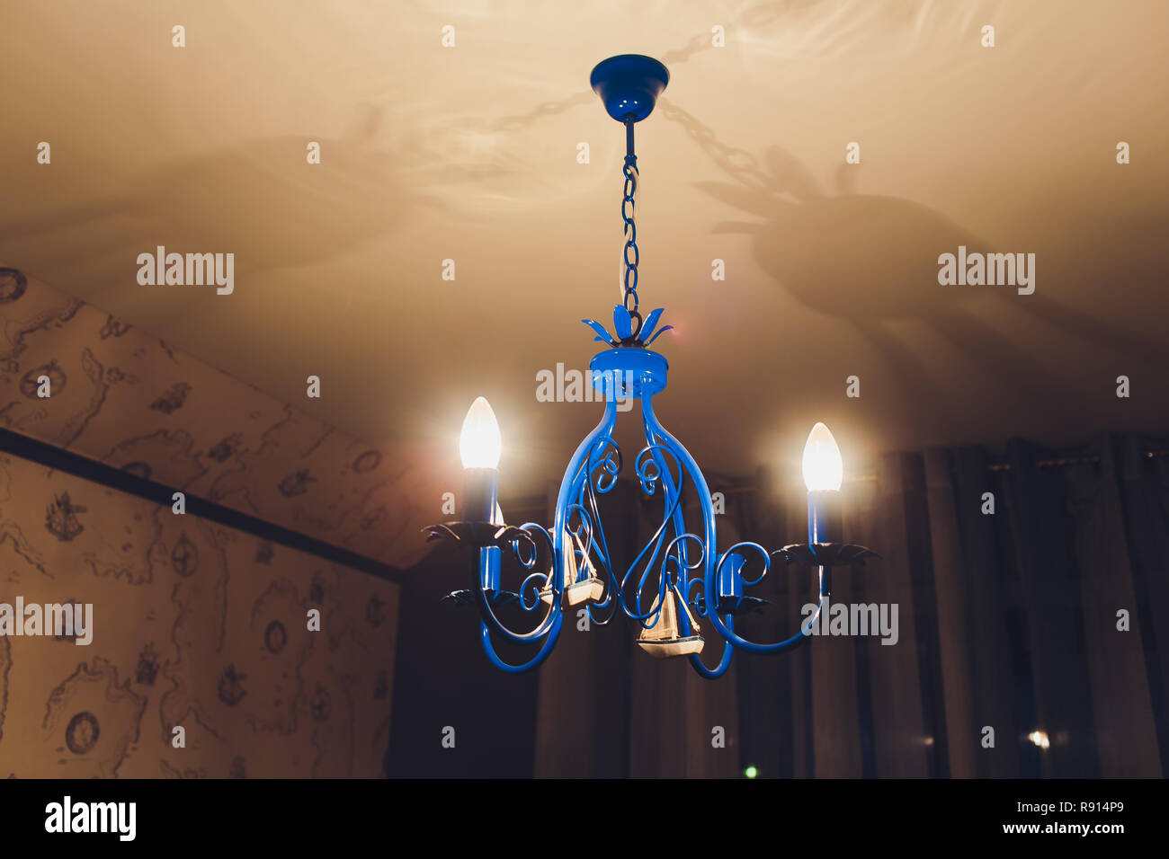 Blue Ceiling lamps on brown wood ceiling. Ceiling lamps, electric blue ...