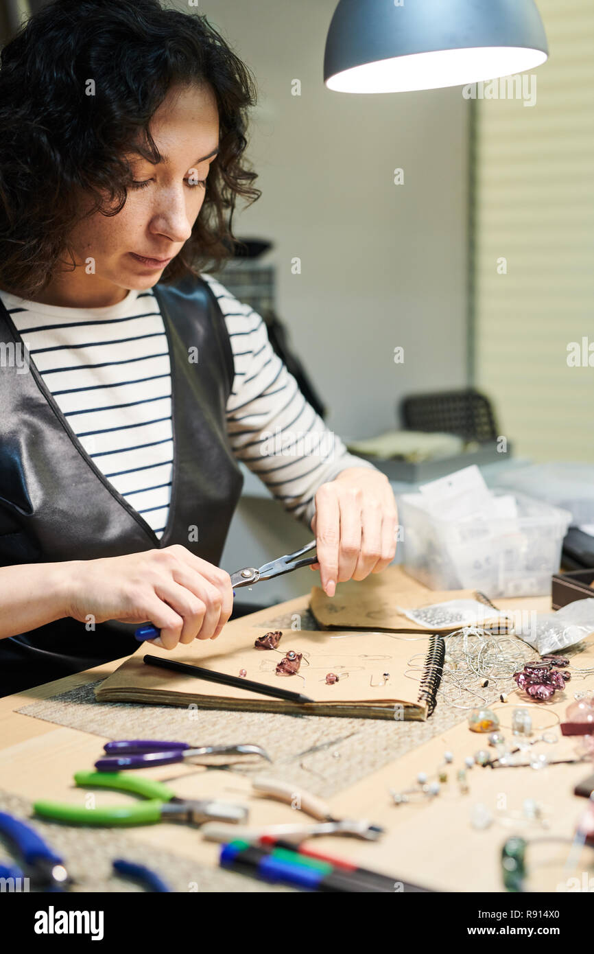 Female Artist Creating Jewelry Stock Photo - Alamy