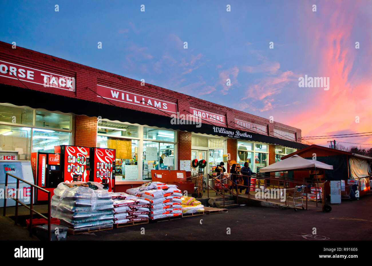 The sun sets on Williams Brothers General Store, Dec. 11, 2012 in ...