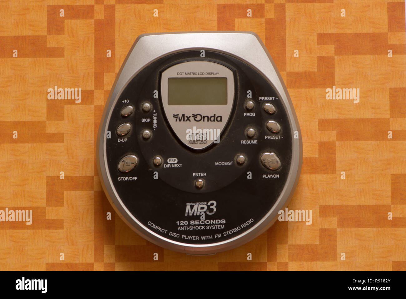 A black CD player on an orange background Stock Photo - Alamy