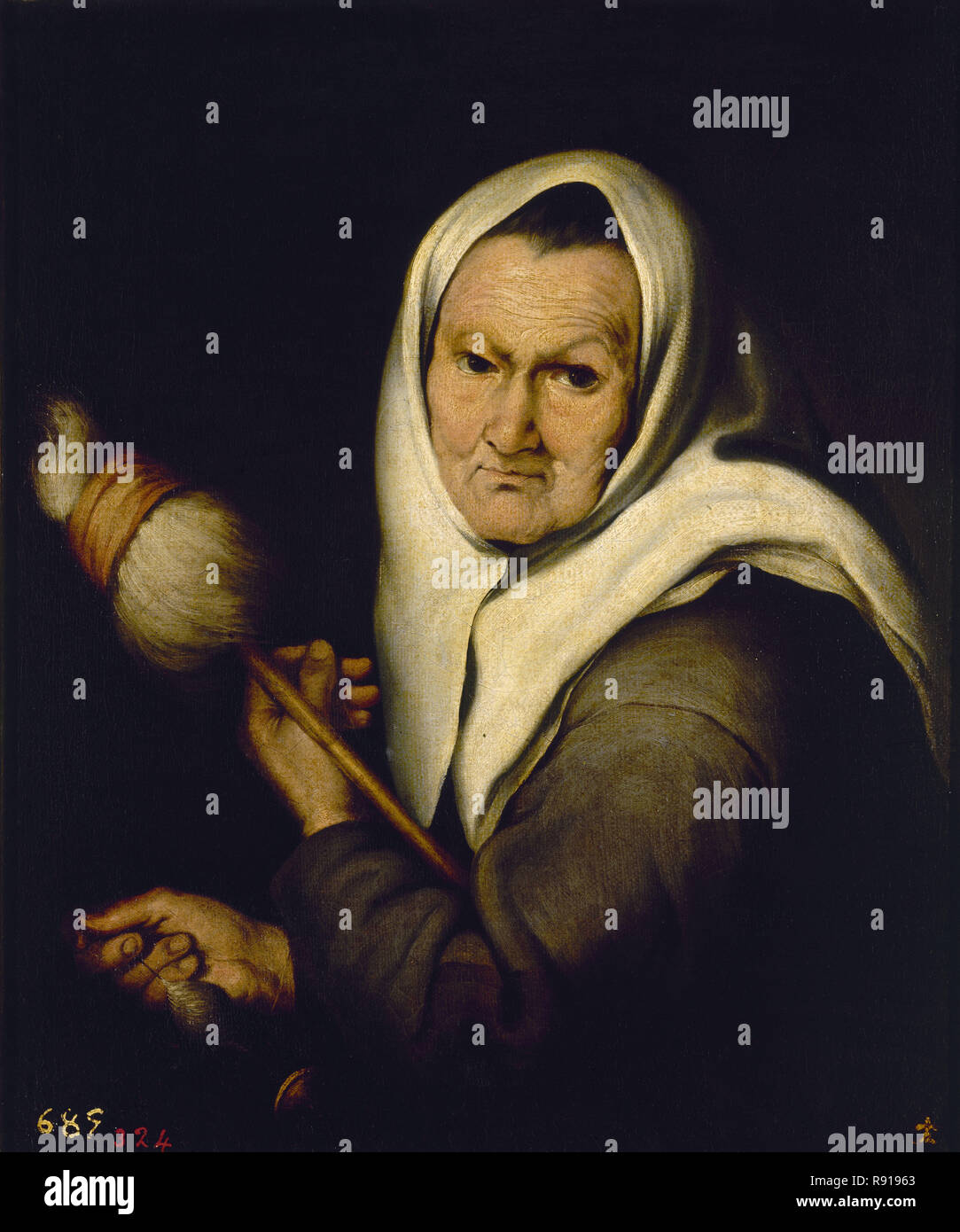 Woman with distaff hi-res stock photography and images - Alamy