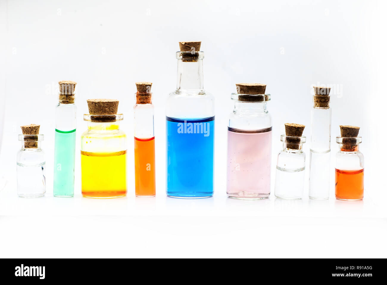 Close up glass measuring beakers for science experiment background ...