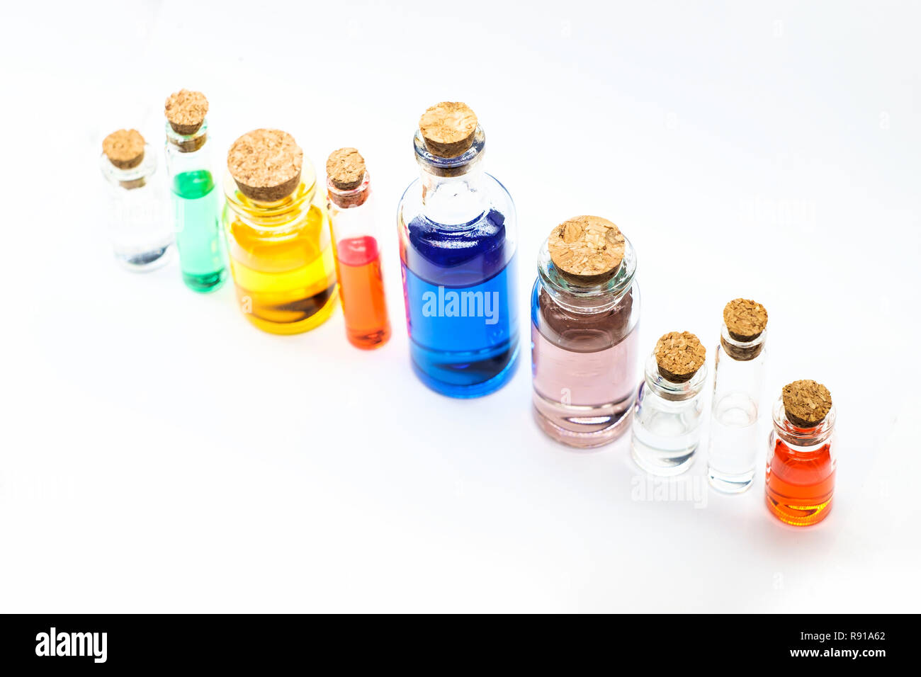 Close up glass measuring beakers for science experiment background ...