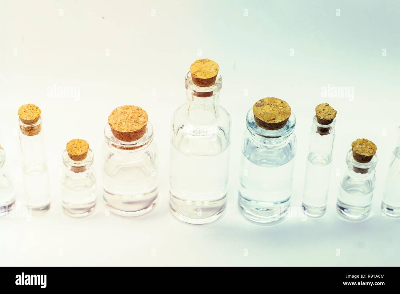 Close up glass measuring beakers for science experiment background ...