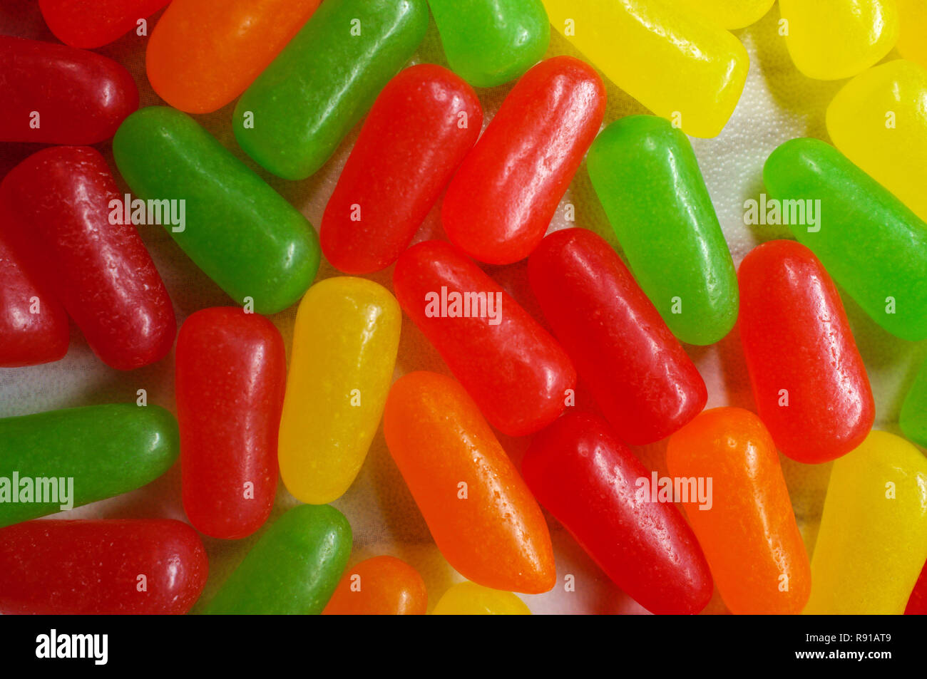 Fruit flavored colorful candy jelly bean gummies Stock Photo - Alamy