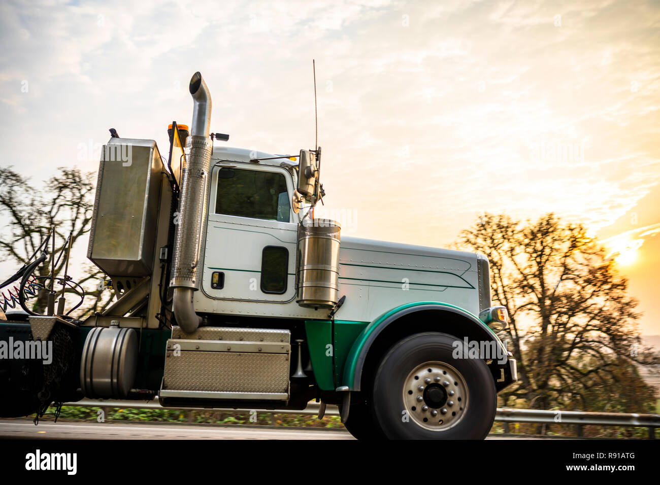 Profile of big rig American bonnet day cab semi truck with vertical ...