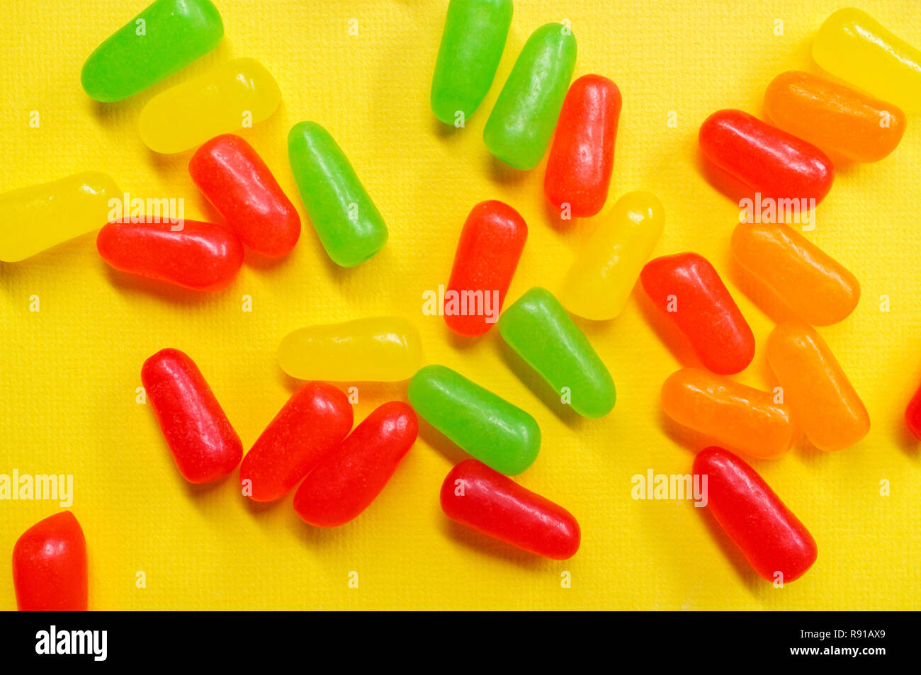 Fruit flavored colorful candy jelly bean gummies Stock Photo - Alamy
