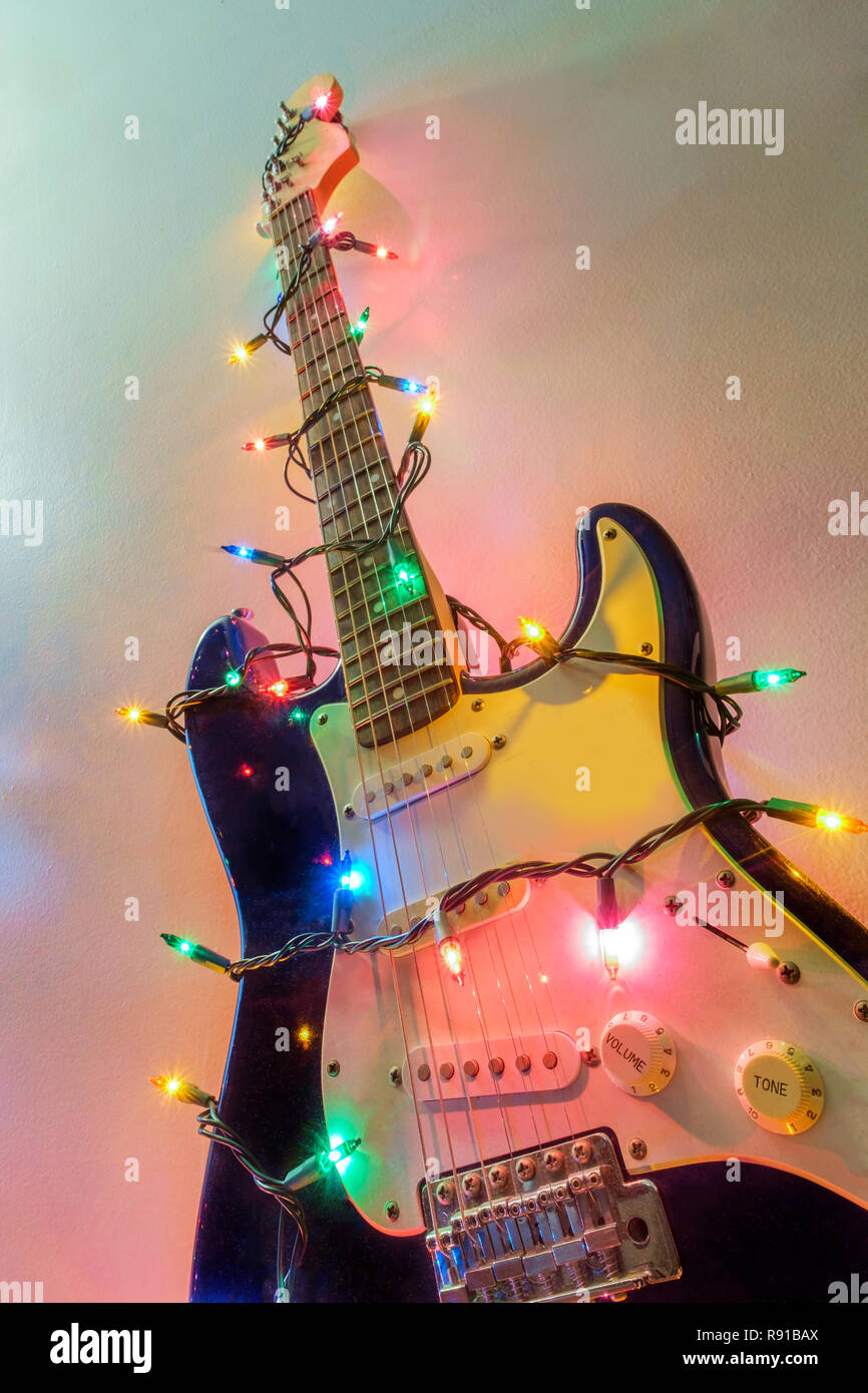 Seasonal holiday musical instrument electric guitar wrapped in ...