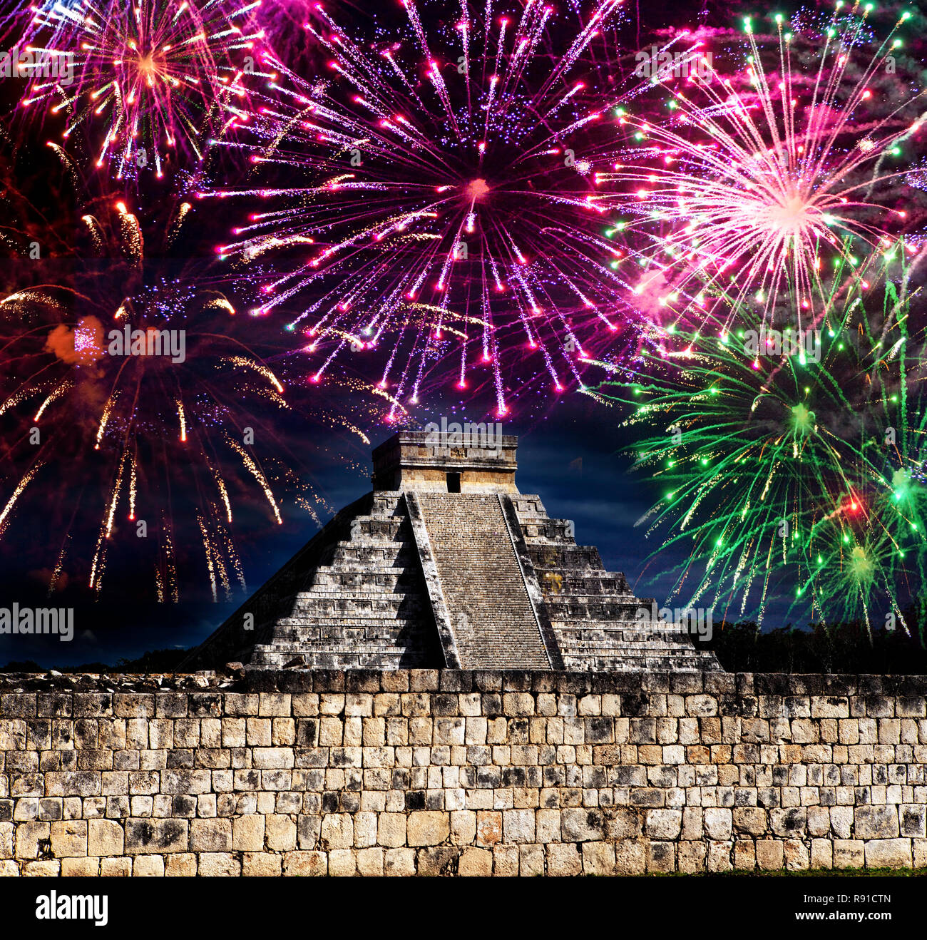 Festive fireworks over Famous El Castillo pyramid in Yucatan, Mexico ...