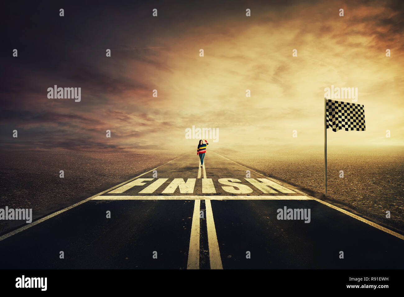 Competitive young woman on the road celebrate waving hand raised up ...