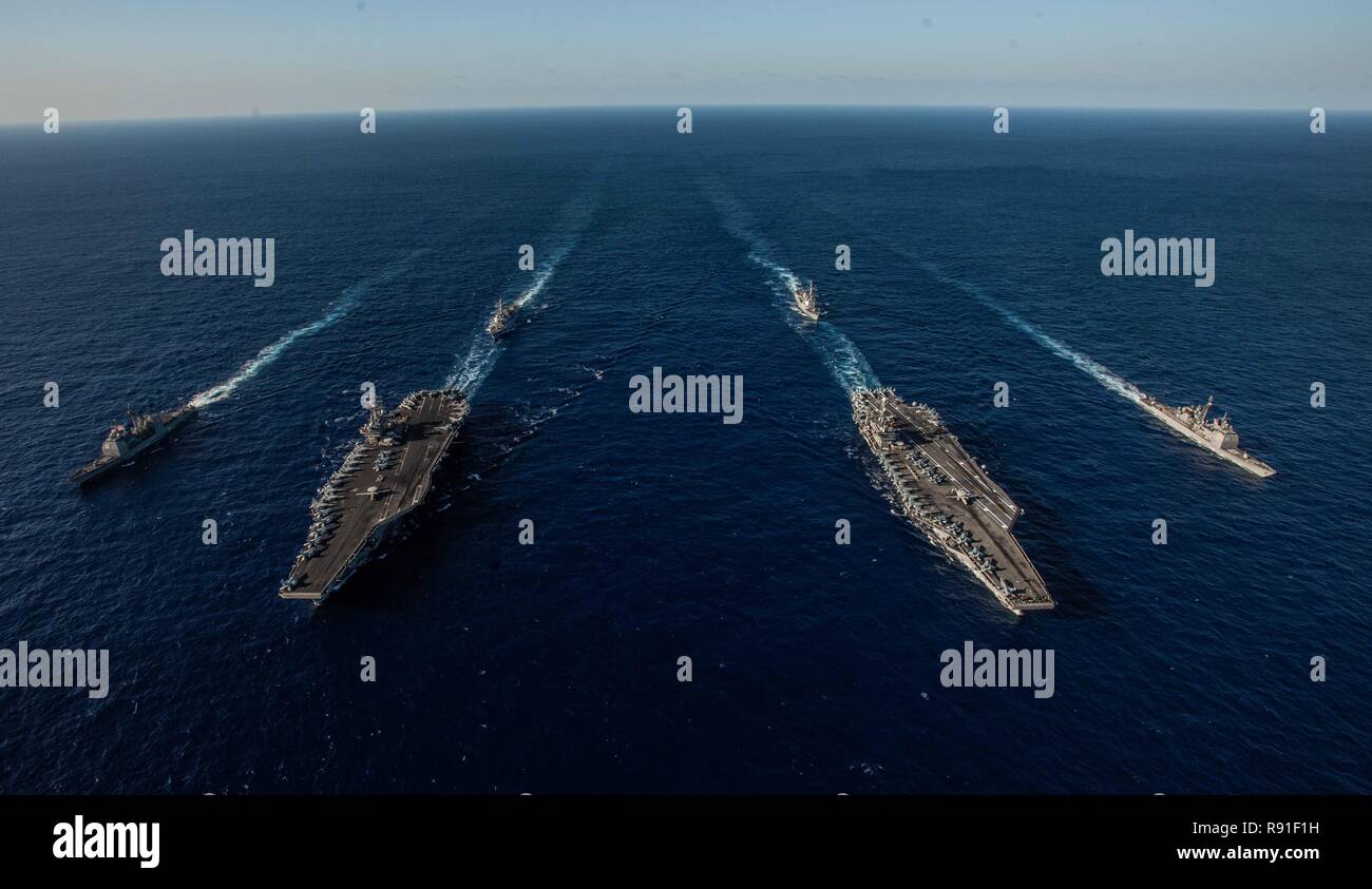 The U S Navy Nimitz Class Aircraft Carrier Uss John C Stennis And Uss