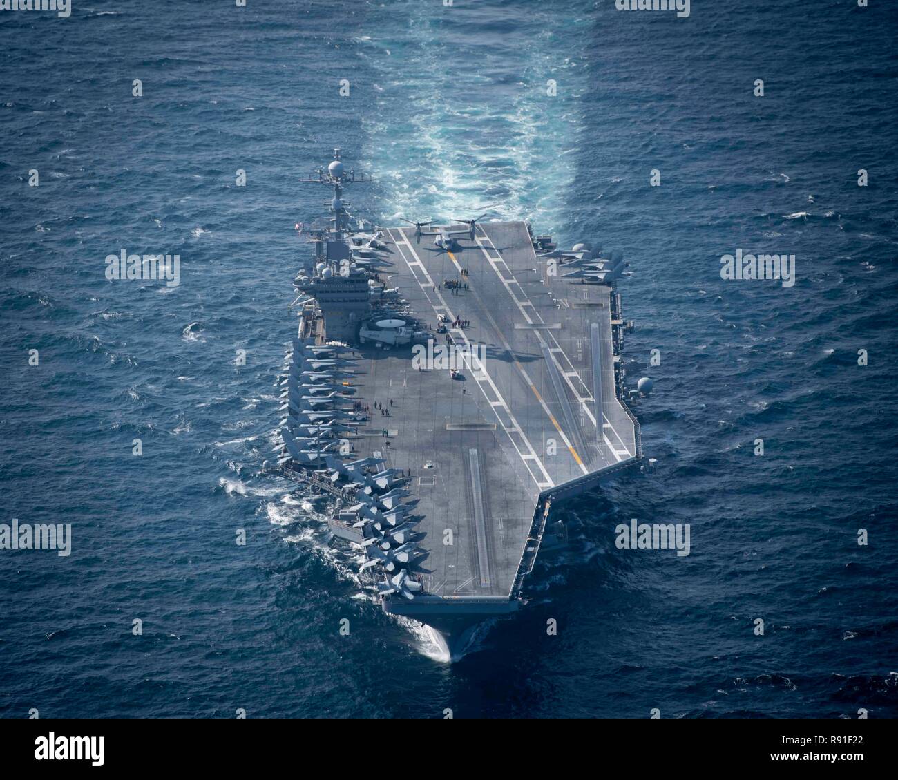 The U.S. Nimitz Class aircraft carrier USS John C. Stennis underway during routine patrol ...